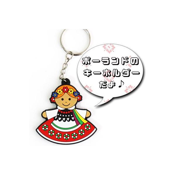 ポーランドの古都クラクフの民族衣装を着た女の子☆お花柄の髪飾りとお花柄のスカートがとってもキュートちょっと柔らかいゴム製で、両面に絵柄が付いています。私も６か月使っていますが、絵がはげたりしない品質の良い品です。約 タテ5.4cm　ヨコ5....