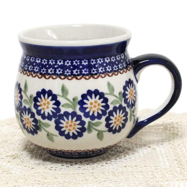 ポーランドから可愛いマグカップが入荷しました。大きめサイズでミルクをたっぷり入れたカフェオレやスープをお飲みになるのにちょうど良い大きさ300ml入れるとちょうどよく持てる感じです。満水時容量は約350mlです。ネイビーブルーのお花が並んだ...