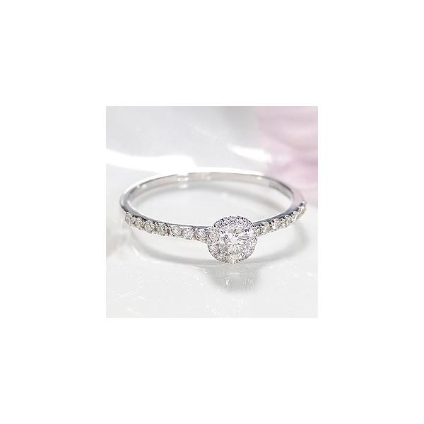 ☆18金アームのセンターに天然ダイヤモンド0.12ctをセッティングし、周りをダイヤで取り巻いたトータルで0.32ctの華やかリング♪ アームのラインにも輝くダイヤモンドをあしらって、贅沢に仕上げました。品質にこだわり、透明度、輝きのよい高...