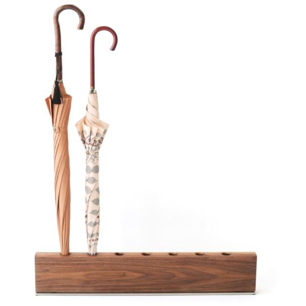 暖かみのある45mm厚の天然無垢材を贅沢に使用しています。ボトムの5mm厚ステンレスが、シンプルなフォルムを引き立てている個性的な傘立てです。別売りで専用の水受けステンレストレイをご用意しています。追加の場合は、追加オプションよりご選択くだ...
