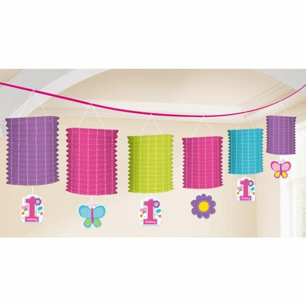 ・12' long・Pastel-colored lanterns with hanging cutouts of flowers, butterflies and "1st Birthday"・Celebrate in style wit...