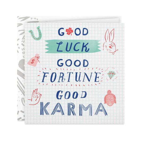 ・Cover features fun illustrations of a horseshoe, bag of money, four-leaf clover and other auspicious symbols with text ...