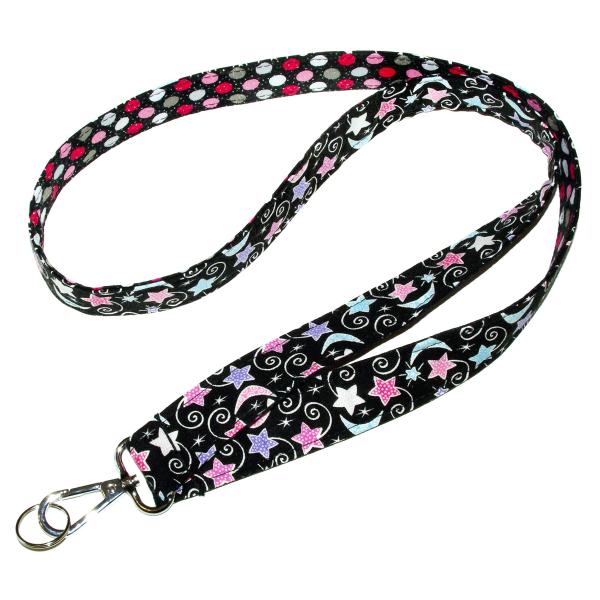・This colorful galaxy print lanyard combines pastel stars and moons on black with glittery pink dots. The 1 inch wide, 1...