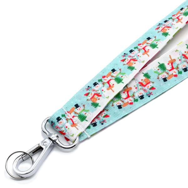 ・One side is light blue with colorful groups of snowmen. The reverse is a colorful dot print.・This 1 inch wide strap is ...
