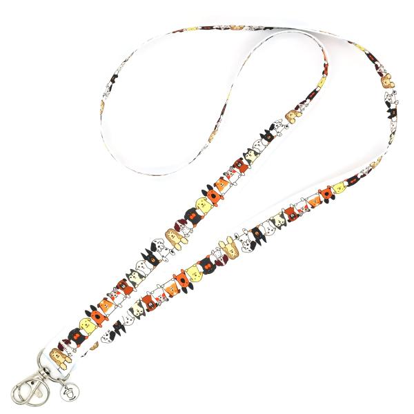 ・A reversible lanyard made just for dog lovers. This 3/4 inch wide strap is decorated with a row of cute dogs. The back ...