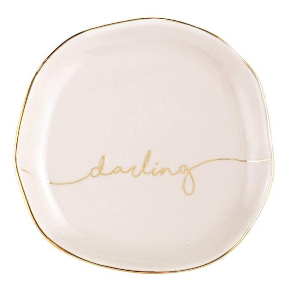 ・ミニマルでモダンなデザインのセラミック製トレイ。底面は素焼きでオーガニックな形状で、一つ一つ手作りの外観になっています。・直径4.5インチ。・ゴールドエッジと文字「Darling」の文字が入ったブラッシュピンク。・かわいいので便利:シンク...