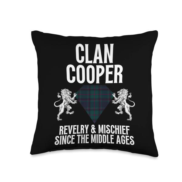 ・Cooper Clan Coat Of Arms On a Cooper Scottish Tartan Background, with text that says: Revelry and Mischief Since The Mi...
