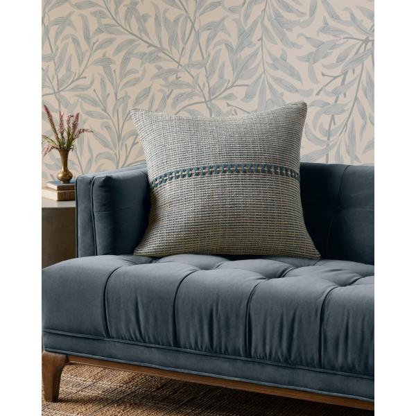 ・Harvey is an oceanic blue and tan throw pillow with a textured, woven stripe across its center; designed by Chris Loves...