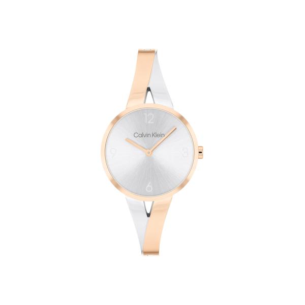 ・Sculpted jewelry-inspired bangle with a sensual taper around the wrist. Elegantly minimal with a clean sunray dial, fea...