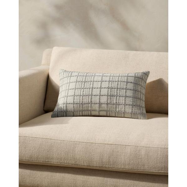 ・This two-toned throw pillow from Magnolia Home by Joanna Gaines x Loloi features a windowpane check design in a neutral...
