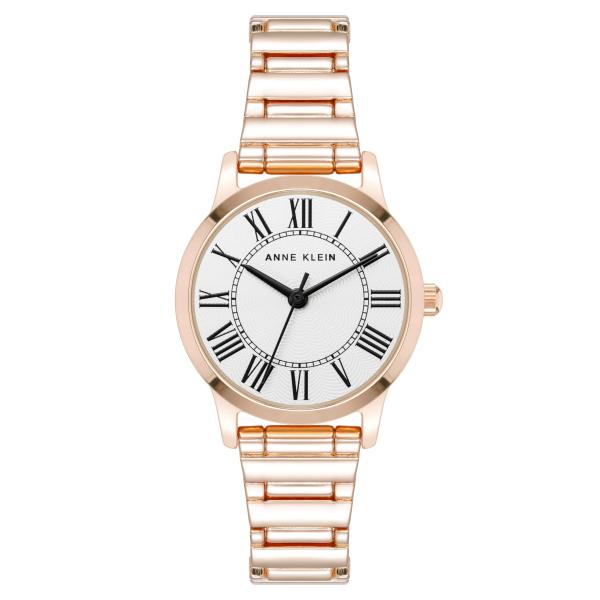 ・Slightly domed mineral crystal lens・Silver-tone patterned dial with black hands and Roman numerals; inner rail minute t...