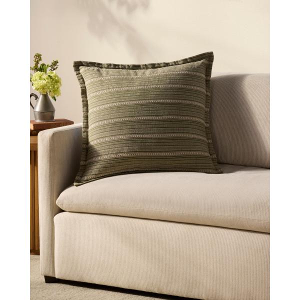 ・Striped Green Throw Pillow: Howie is a sage green-striped throw pillow with textured beige details and flange edges; de...
