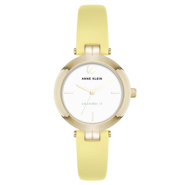 ・Mineral crystal lens・Silver-tone dial with gold-tone hands and markers・Yellow sustainable leather strap with buckle clo...