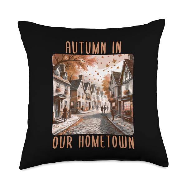 ・Cozy Small Town Fall.・This merchandise, which shows a picturesque small town scene with charming cottages, falling leav...