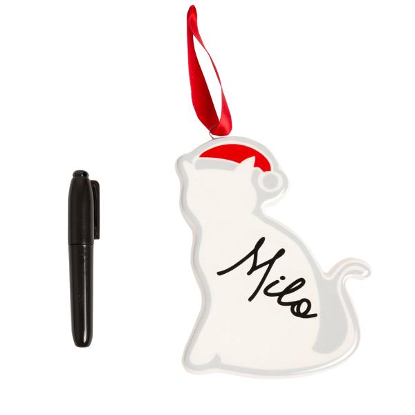 ・PERSONALIZED CAT CHRISTMAS ORNAMENT: White ceramic ornament features a sitting cat silhouette wearing a Santa hat and i...