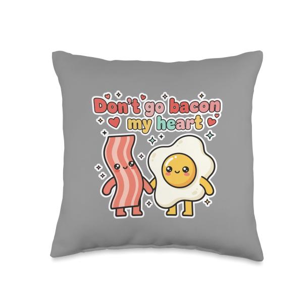 ・This design showcases adorable kawaii-style bacon and egg characters holding hands, surrounded by hearts and starbursts...