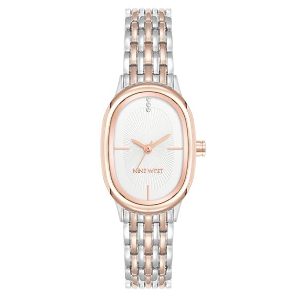 ・Case diameter: 23mm; mineral crystal lens・Silver-tone textured dial with genuine crystals at 12; rose gold-tone hands a...