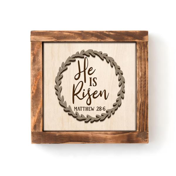 ・?? Faith-Inspired Scripture Design: Features the uplifting message "He Is Risen" with reference to Matthew 28:6, symbol...