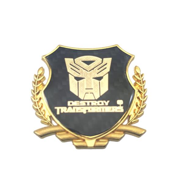 商品名:  Metal Transformers Autobots Logo Emblem Rear Trunk Side Fender Carbon Fiber Auto Badge Sticker Decal (Gold)ブランド: Z...