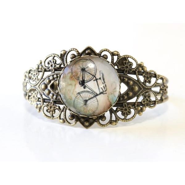 ポイント2倍 ポイント消化アンティーク風レトロアクセサリー ブレスレットが新入荷！円盤にかわいい自転車柄がワインポイントバングル★全体的にアンティーク調でオシャレなブレスレット♪カジュアルスタイルにもエスニックスタイルにも合わせやすいデザイ...