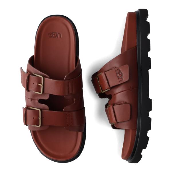 【ビーチスタイルからラグジュアリーまで世界中が認めるブランド UGG】上品なのにカジュアル。洗練されているのにシンプル。UGGのキャピトーラ バックル スライドは、信じられないほど軽量なサトウキビ EVA アウトソールを使用してデザインして...