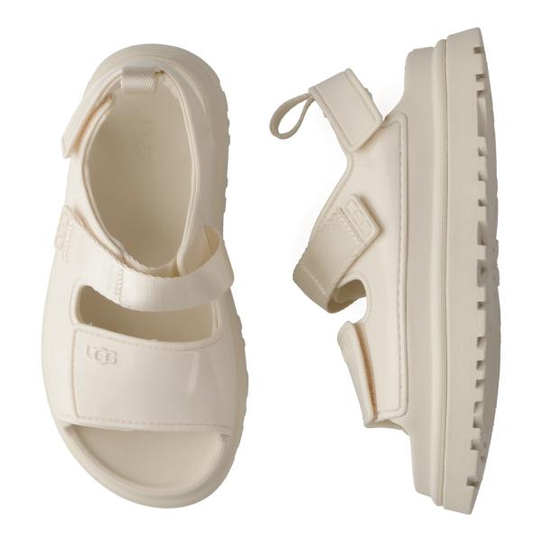 【ビーチスタイルからラグジュアリーまで世界中が認めるブランド UGG】UGGのキッズ向けサンダルK GOLDENGLOW GLOSSY SPARKLES(ゴールデングロウグロッシースパークルズ)です。アッパーに光沢感のあるグロッシー素材とラ...