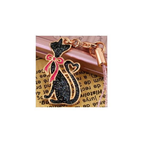 キラキラに輝くラメのプレートでできたブラックキャットのシルエット型！ピンクのリボンがポイントです★チャーム部分がカニカンになっているので、はずしてお手持ちのストラップにもつけられます♪プレゼント、ギフトにも喜ばれそうな、ストラップです。チャ...