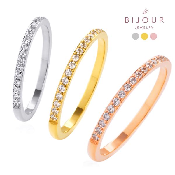 センターにビジューを並べたステンレス製ハーフエタニティリングです。センターに煌めくビジューを並べたシンプル且つ上品な仕上がりの指輪で、手元をさりげなく綺麗に見せてくれるハーフエタニティデザイン。シンプルで綺麗なたたずまいは毎日使いにも大活躍...