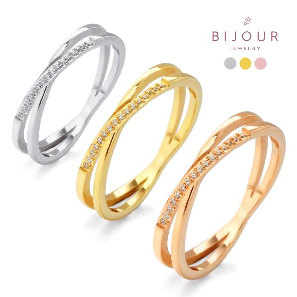 エレガントなクロスラインにビジューが煌めくステンレス製リングです。クロスラインの一方に煌めくビジューを並べた優美なデザインの指輪で、いつでもどこでもあなたと一緒に。シンプルで上品なデザインだからデイリー使いにも重宝。また、ステンレス製なので...