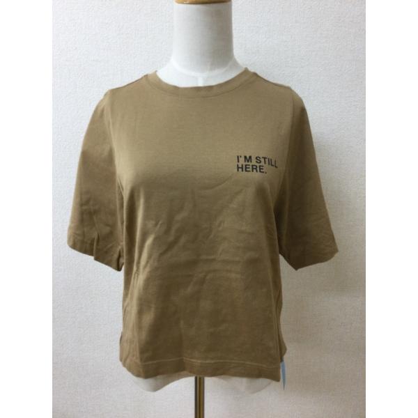 茶色のTシャツ I‘M STILL HERE