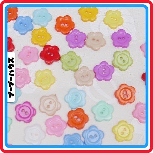 お花のボタン　手芸用　10個入り　12mmです♪【サイズ】12mm【個数】１０個【素材】プラスチック＊お写真にない色が含まれる場合がございます。＊お色はお選びいただけません。☆海外輸入品のため、バリ、色むら、色移りなどの作りが荒い、個体差が...