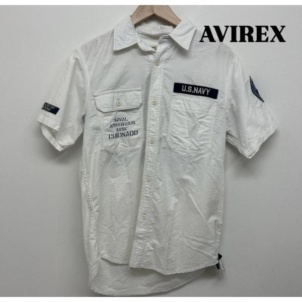 メーカー：アヴィレックス / AVIREX形状：シャツ、ブラウス / 半袖サイズ：表記サイズ：M肩幅：43 cm、袖丈：22 cm、着丈：70 cm、身幅：47 cmカラー：白 / ホワイト柄 / パターン：ロゴ、文字、ワンポイント素材：綿...