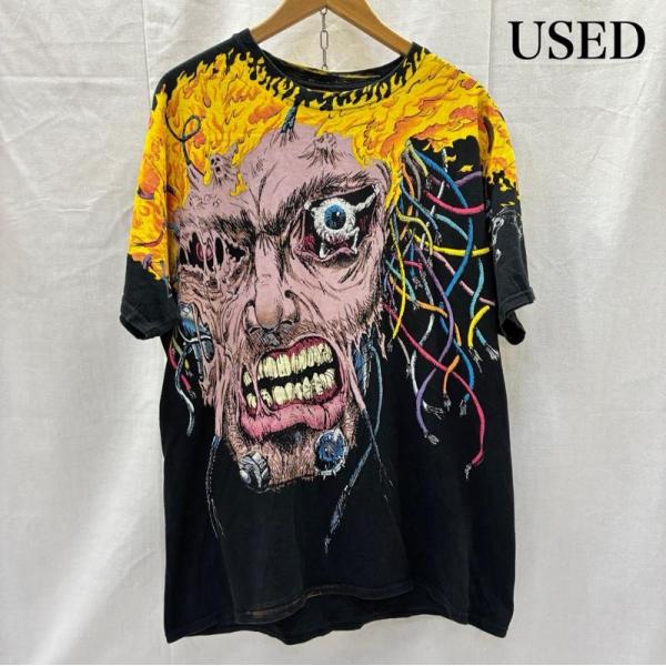 メーカー：古着 / USED形状：Tシャツ / 半袖サイズ：表記サイズ：L肩幅：53 cm、袖丈：18.5 cm、着丈：72 cm、身幅：54.5 cmカラー：黒 / ブラック柄 / パターン：総柄、キャラクター素材：画像参照商品状態：着用...