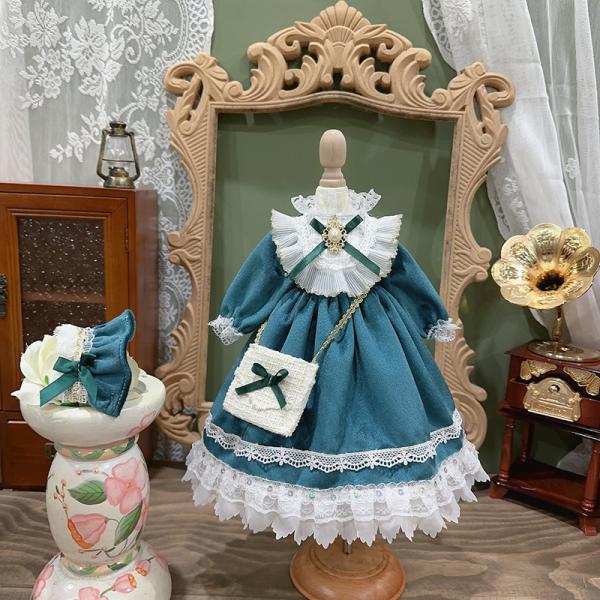 深みのあるグリーンベロアと繊細なレースを組み合わせた、クラシカルで上品なロリータドールワンピースセット。胸元の大粒パールとリボン装飾、ふんわり広がる2段レーススカートがアンティークドールのような気品ある雰囲気に仕上げます。長袖デザインで秋冬...