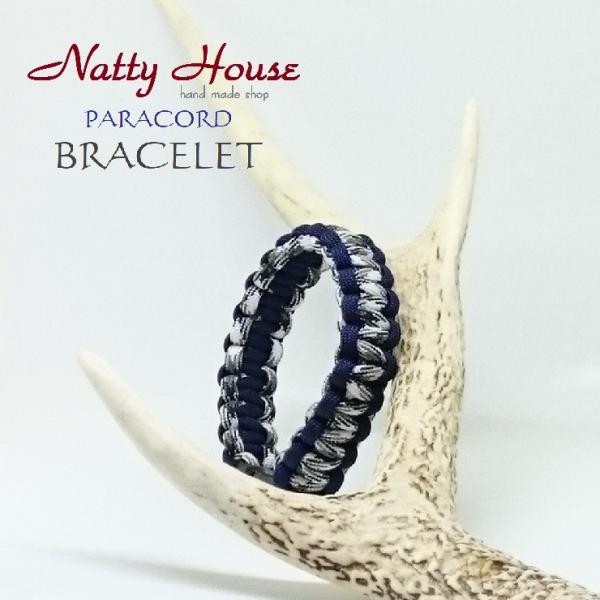 パラコード ブレスレット nwc パラシュート ロープ アウトドア サバイバル◆ パラシュートコード、通称パラコードを匠に編上げた定番のブレスレットです。◆ パラコードは、ナイロン素材の1本で耐荷重200kgと言われる大変丈夫なコードです。...