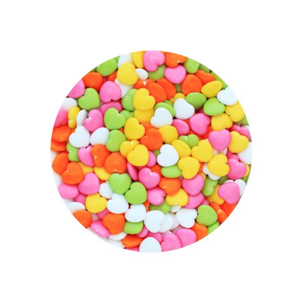 5色のかわいいハートのラムネです。手作りケーキのトッピングなどにいかがですか。原材料　：ぶどう糖(国内製造)、砂糖、でん粉、水飴、デキストリン／酸味料、乳化剤、増粘剤(アラビアガム)、光沢剤、香料、着色料(クチナシ、野菜色素、紅麹、パプリカ...