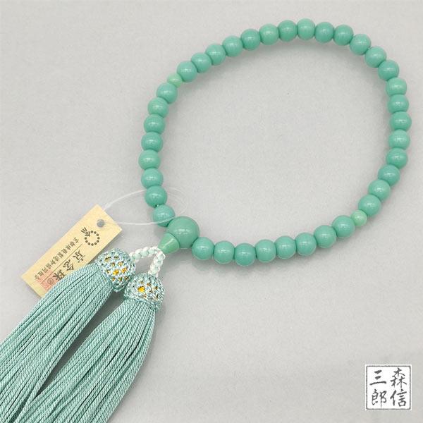【メール便OK】女性用 数珠 7.7mm トルコ石風(イミテーション) (房色・グリーン) ガラス玉製数珠主玉・親玉・二天の全てに【カラーガラス玉】を使用したお手頃価格ながらも高級感の有る一品になります。商品詳細主玉 　ガラス玉 約7.7m...