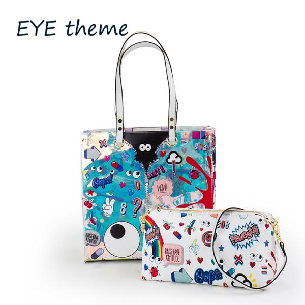 EYE THEME(アイテーマ)からインナーポーチ付きのクリアトートバッグが入荷。オーロラのクリア素材にカラフルなイラストが散りばめられたエネルギッシュなデザイン。華やかなパターンを定番の形に仕上げたカジュアルで使い勝手の良いバッグです。A...