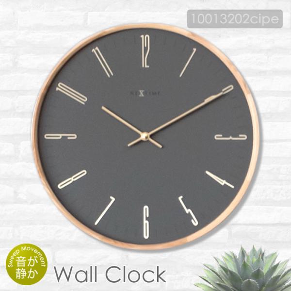 ■スリムな木製フレームがスタイリッシュにお部屋を彩るナチュラルモダンなウォールクロック。■アルミ素材のゴールドの数字は光の当たり方によって表情を変化させます。■時計のカチコチ音が気にならないスイープムーブメントを採用♪■商品名／壁掛け時計 ...