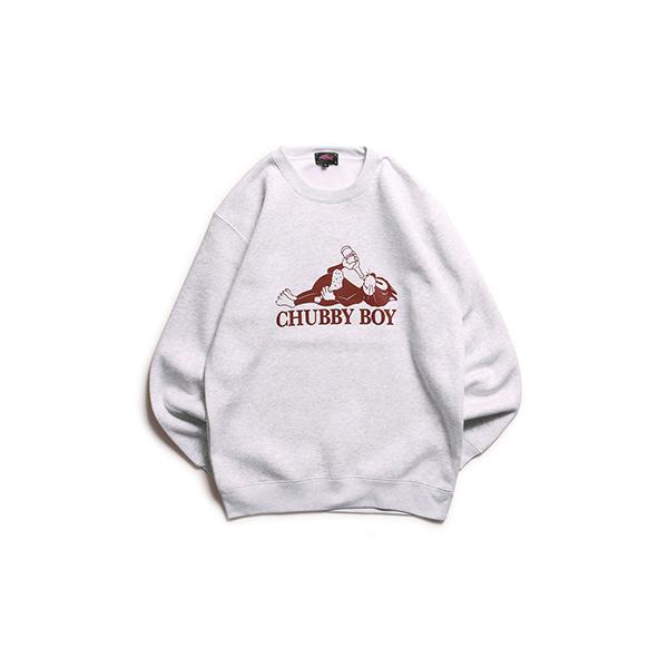 【ROTAR2025冬物予約商品】怠け猫を描いたCHUBBYBOYのグラフィックスウェット。横になりながらチキンをつまみにビールを飲む黒猫の様子が描かれています。ぽっちゃりとしたお腹はまさに「CHUBBYBOY」。分かっていてもついついやっ...