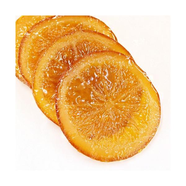 ヴァレンシア産の良質なオレンジを皮付きのままスライスし、特殊釜でじっくり煮上げた製品です。オレンジスライスの琥珀色に透き通った美しさとビター感をお楽しみください。ショコラ掛けはもちろん、焼き菓子などさまざまな用途にご使用いただけます。