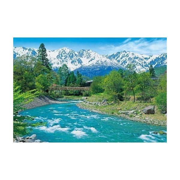 サイズ：26x38cm300ピース雄大な北アルプスを背景に、大出の吊り橋、姫川の清流、茅葺の民家などが揃った素朴な日本の原風景です。この白馬三山が美しく望める場所には多くの観光客が訪れます。初めての方でも気軽に楽しめる300ピースです。