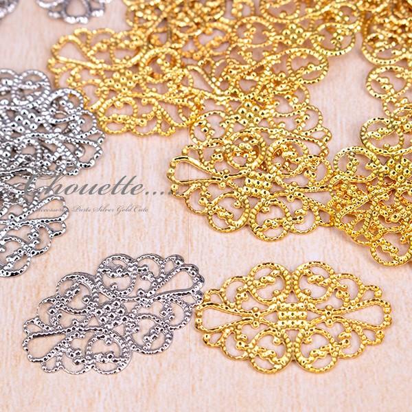 ご覧になって頂きありがとうございます。ピアス、ネックレス、レジン手芸等に♪■サイズ：約20ｍｍ×31ｍｍ■入数:約12個■重さ:約1g(1個の重さになります)■素材:銅◇商品についてのご注意◇・細かい柄の多少の色むらが生じる場合があります。...