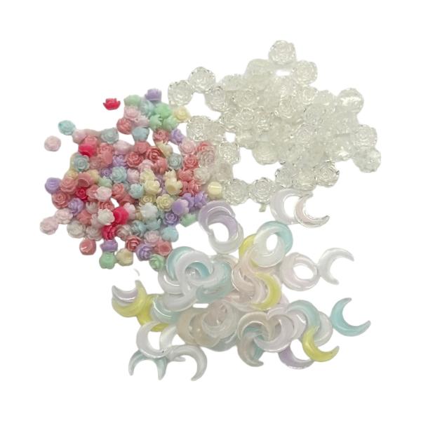 ご覧いただきましてありがとうございます。小さいアクリルパーツです。約100個ほど入っているのでレジンの中に封入したりいろいろな用途でご使用ください。【内容数】約50個【サイズ】画像参照ください。（多少の誤差がある場合がございますのでご了承く...