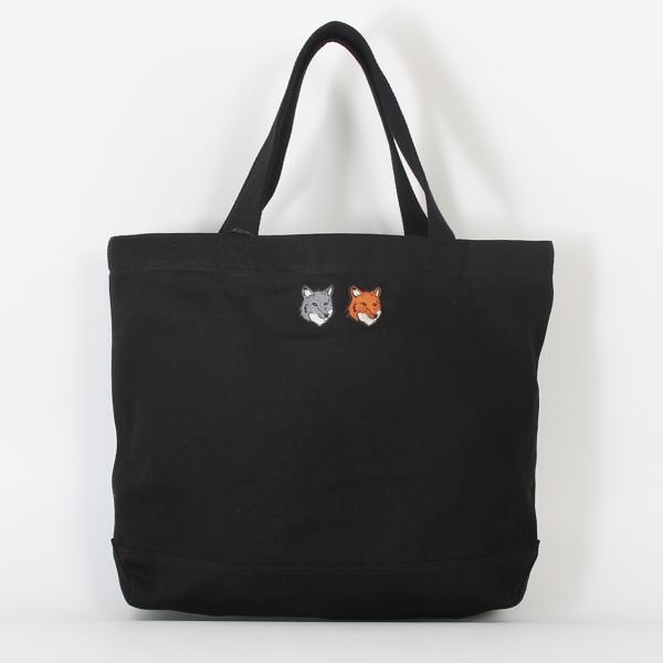 ■スタイルトートバッグ■商品説明【DOUBLE FOX HEAD TOTE】コットンツイル素材を使用したトートバッグで、手持ちと肩掛けの両方に対応するハンドルを備え、メインコンパートメントと内側フラットポケットに加えて、フロントのダブルフォ...
