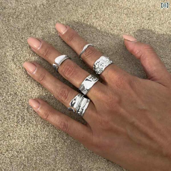 カテゴリ:指輪主な素材:亜鉛合金:幾何学模様加工:電鍍性別:レディースカラー展開:ライトゴールド、ホワイトK流行要素:不規則な形状柄スタイル:テイスト:個性的