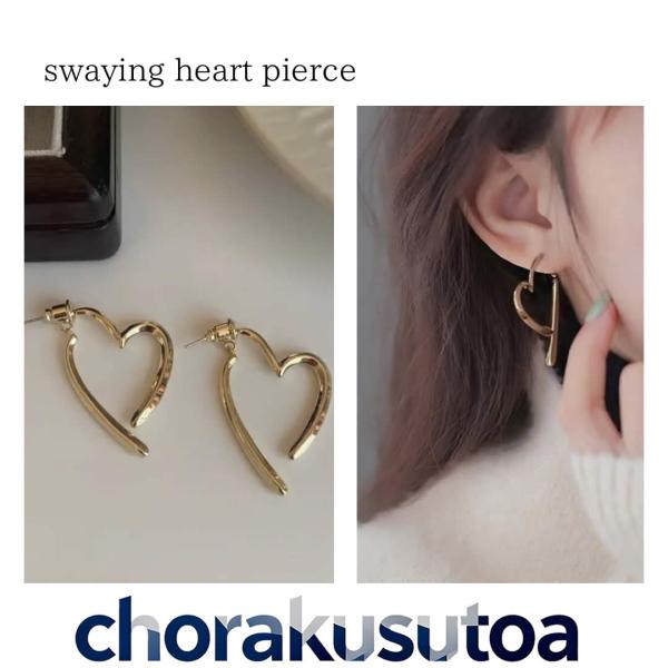 バックキャッチデザインのピアス。耳に付けるとハート型になります?カラー:ゴールド/シルバー素材:シルバー925（ポスト部分）   K14コーティングサイズ:4.8cm（高さ）×2.5cm（幅）※ポスト部分はsilver925素材を利用してお...