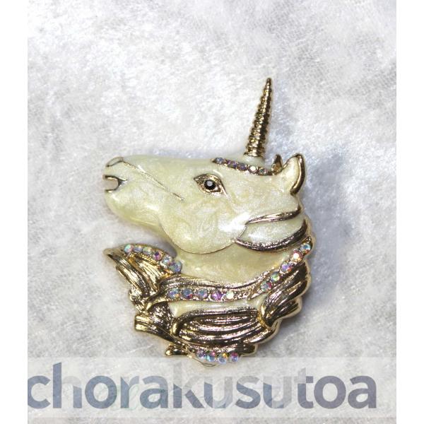 ユニコーンの顔のブローチです。