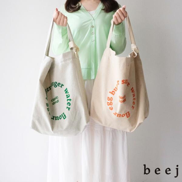 ビージ beej IT012 シーチング バッグ ドーナツ ワンショルダー 大容量 2025SS 春夏 SFG256124POPなフロッキープリントがかわいいショルダーバッグ。中央にフロッキープリントされた文字をMIXするとDoughnut...