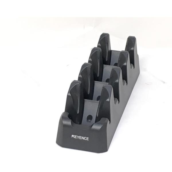 【商品説明】ハンディターミナル　BT-W100 BT-W150 シリーズ の4連充電器です。 【メーカー】KEYENCE 【型番】BT-WUC14【オプション】本体とACケーブアダプタが付属します。 【状態】本体にキズ、汚れがあります。動作...